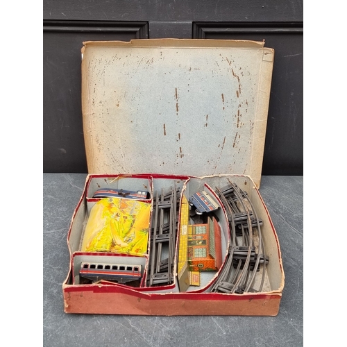 A circa 1930 Brimtoy 'O' Gauge tinplate train set, SP64/211.