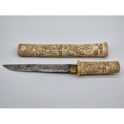 A Japanese Meiji carved bone Tanto and sheath, with 19cm blade, overall ...