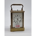 An antique brass carriage clock, with push button repeat and bell ...