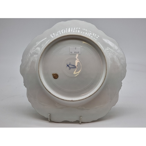A Sevres style cabinet plate, painted with an Edwardian lady and a ...