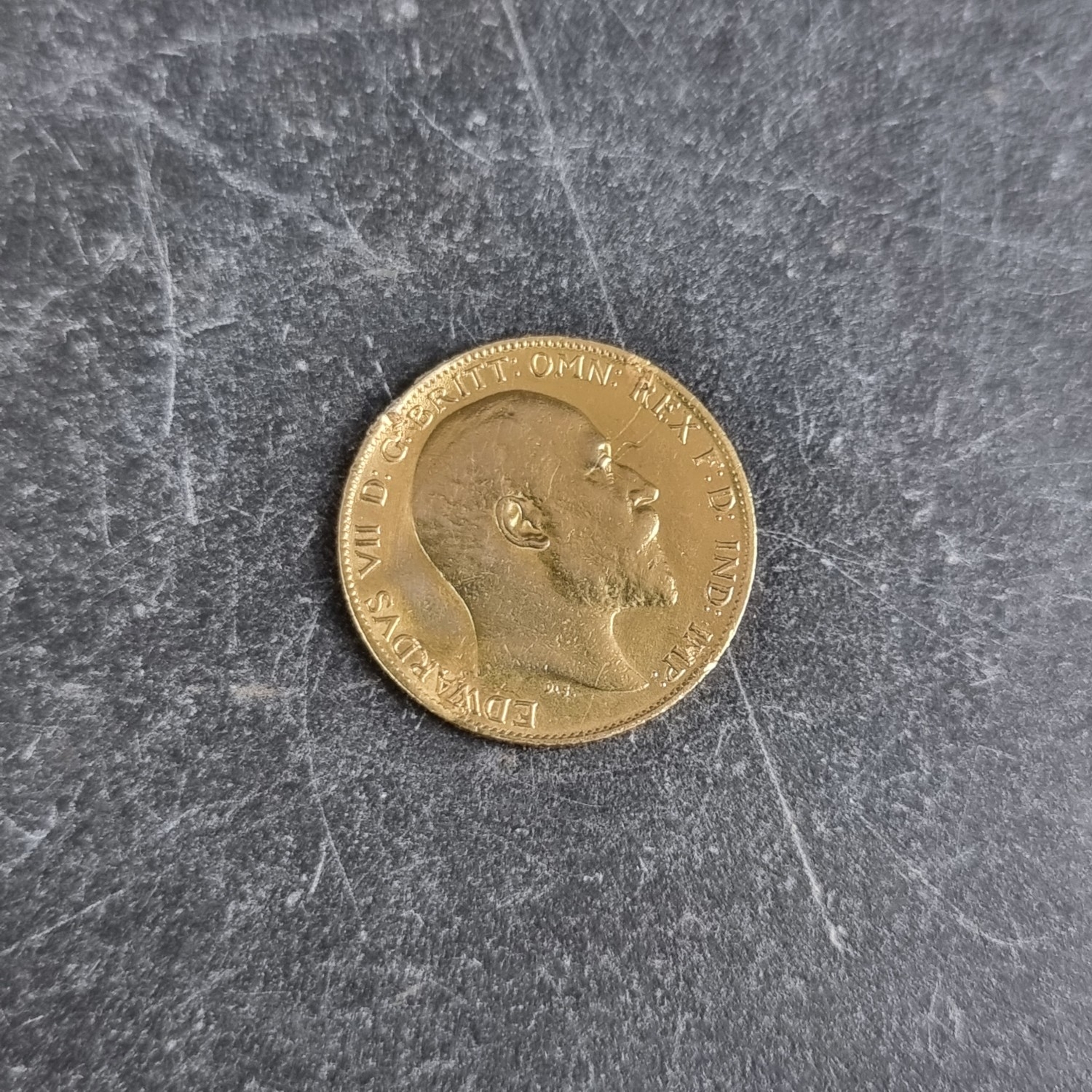 Coins: UK, an Edward VII 1902 gold half sovereign, (ex mount).