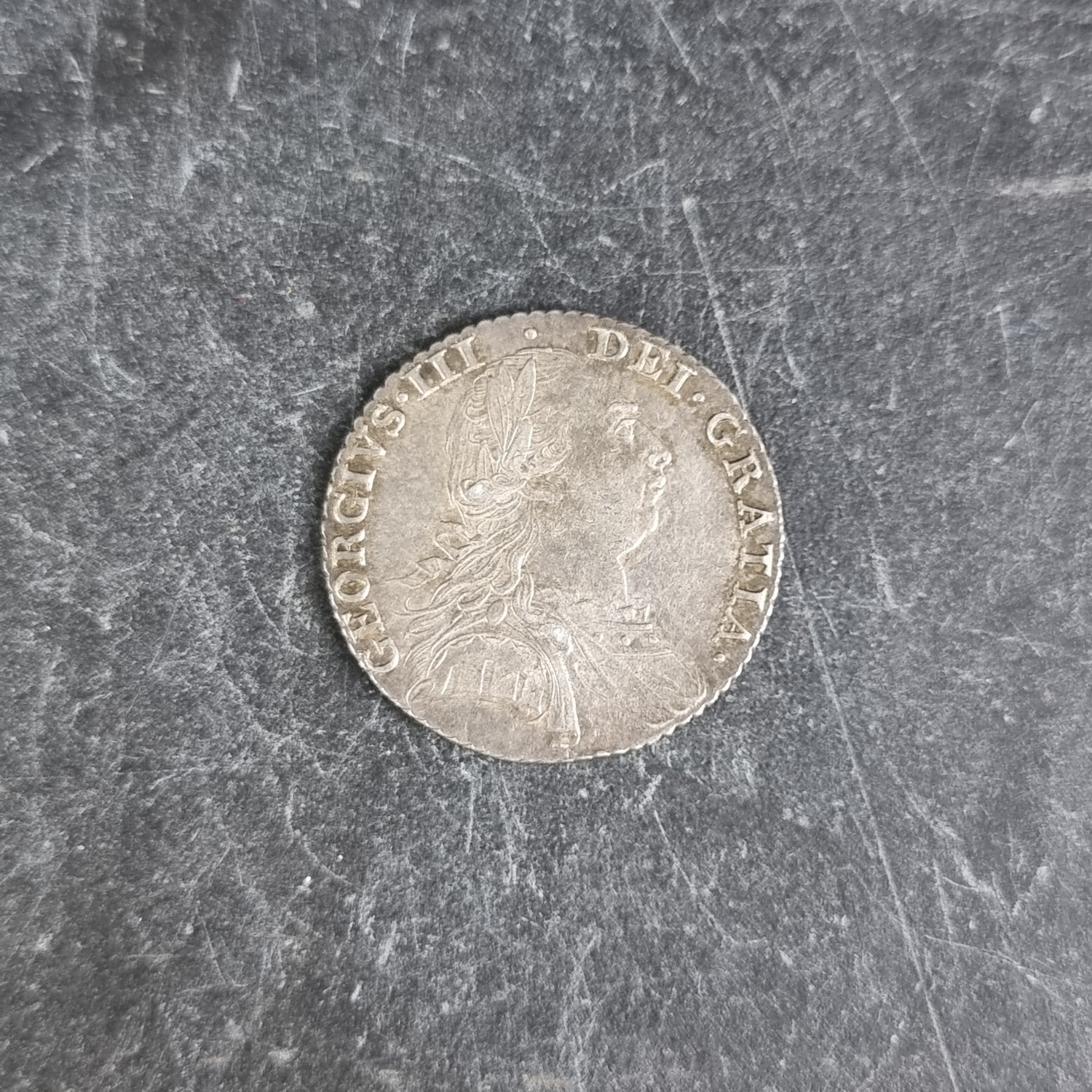 Coins: UK, a George III 1787 silver shilling, (no stops at date).