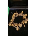LOVELY 9CT GOLD CHARM BRACELET INC LOTS OF LOVELY CHARMS = WEIGHT ...