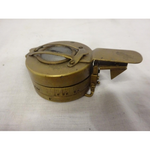 Small brass pocket compass.