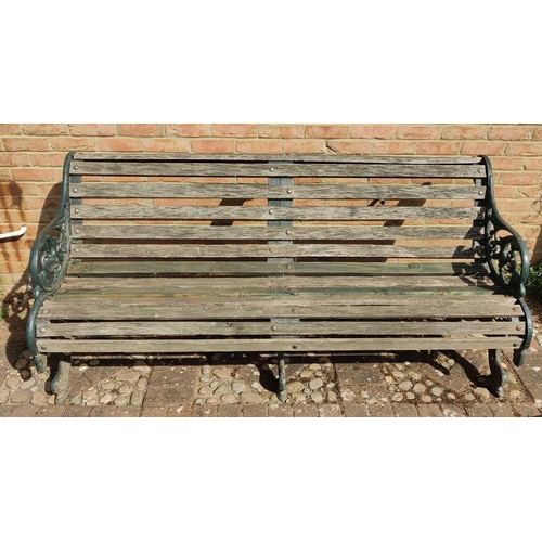 A Victorian Falkirk Royal Parks bench with roll top, having two cast ...