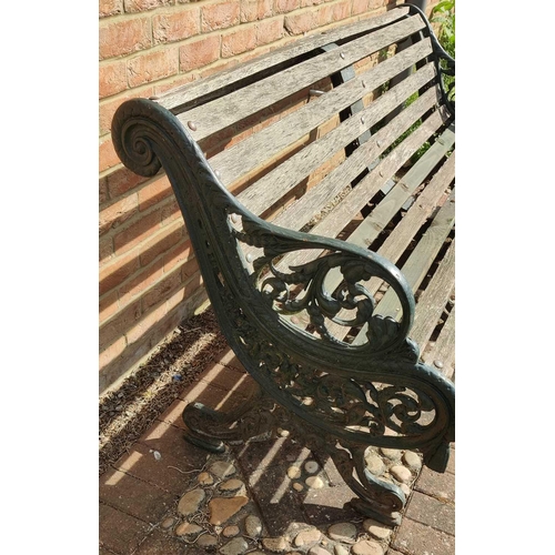 A Victorian Falkirk Royal Parks bench with roll top, having two cast ...