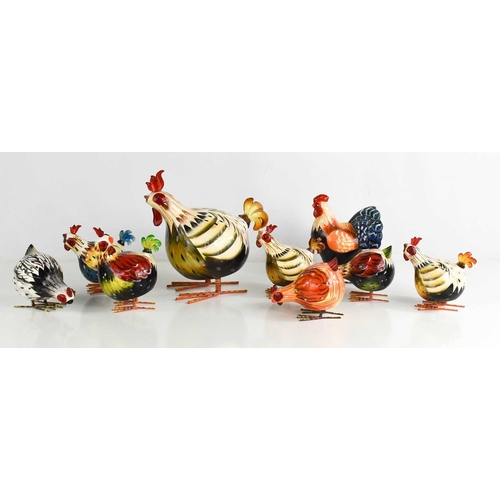 A collection of nine Gallo ceramic rocking roosters and hens.