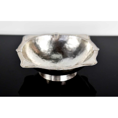 A Scottish Arts and Crafts planished white metal bowl, likely a silver ...