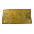 An antique brass bank wall sign / plaque, 24.5cm by 13cm.