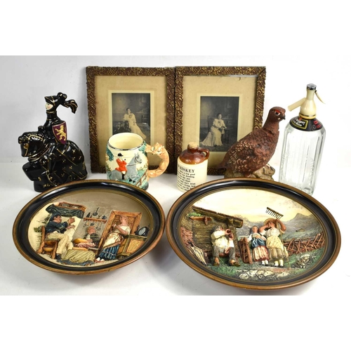 A group of ceramics to include two Musterschutz wall plaques decorated ...