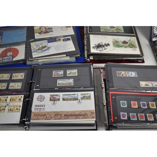 Five albums of First Day Covers and mint stamp presentation packs from ...
