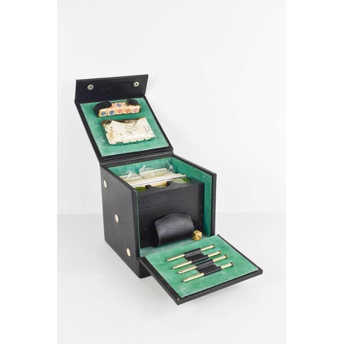 A vintage bridge set circa 1980, the case in the form of a dice.