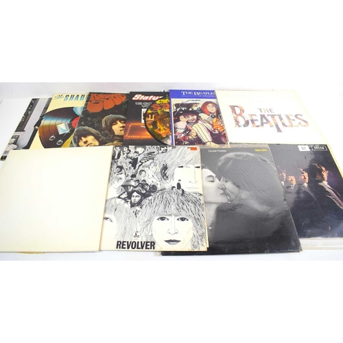 A group of vinyl records to include Beatles White Album, Beatles ...