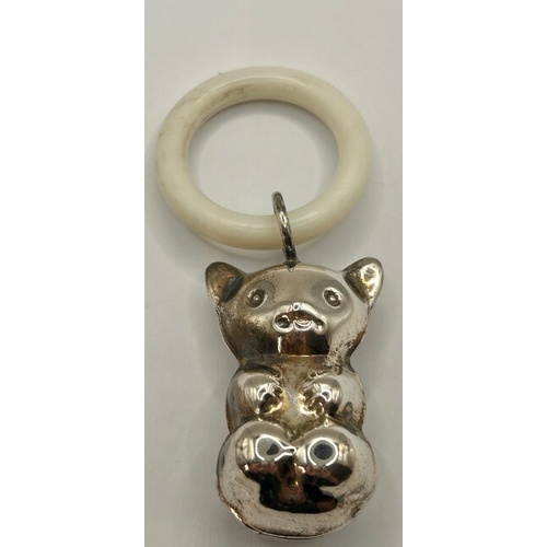 Silver dog baby rattle with teething ring. 9cm x 5cm.