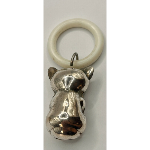 Silver dog baby rattle with teething ring. 9cm x 5cm.