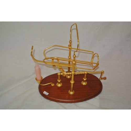 Brass mechanical wine or port decanting cradle with candle holder, on ...