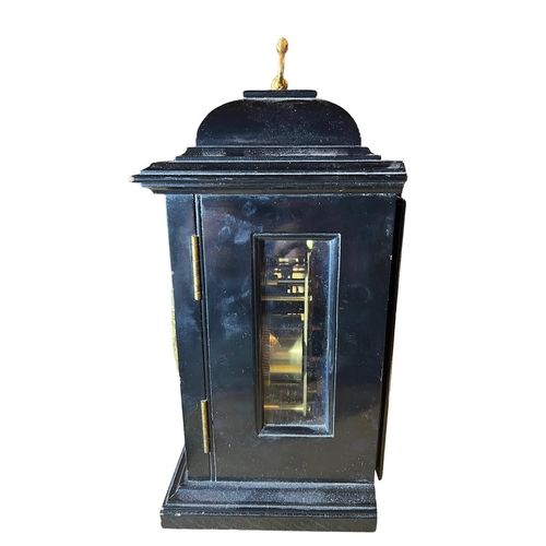 F.W. ELLIOT, AN EIGHT DAY EBONISED CHIMING BRACKET CLOCK With gilt ...