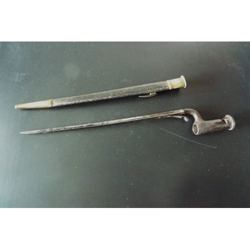 1844 Enfield Musket bayonet in scabbard. The scabbard with brass mounts ...
