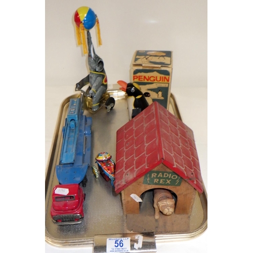 A Radio Rex vintage toy together with misc Japanese Tin clockwork toys ...