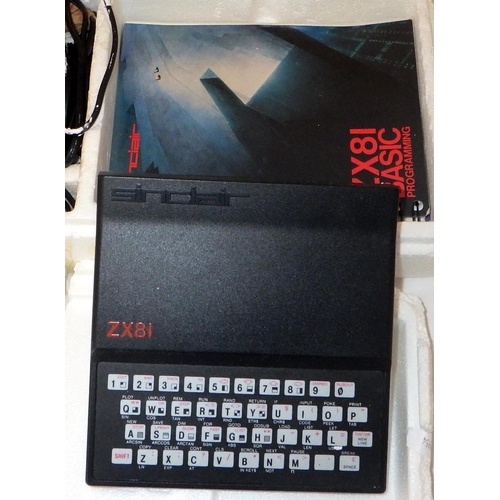A Sinclair ZX81 personal computer together with 16K RAM memory add-on (2)