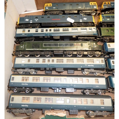Box of 00 gauge model trains