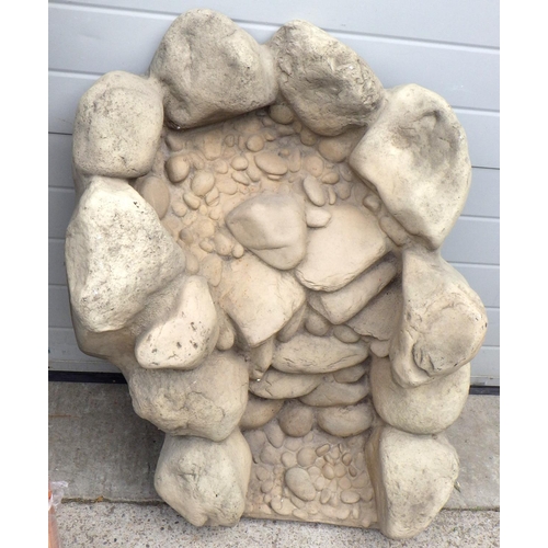 Two rolls of rattan, bag of rattan and a plastic garden water feature