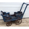 A blue painted pram