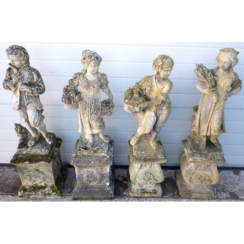 Four concrete garden statues, representing the four seasons, two types ...
