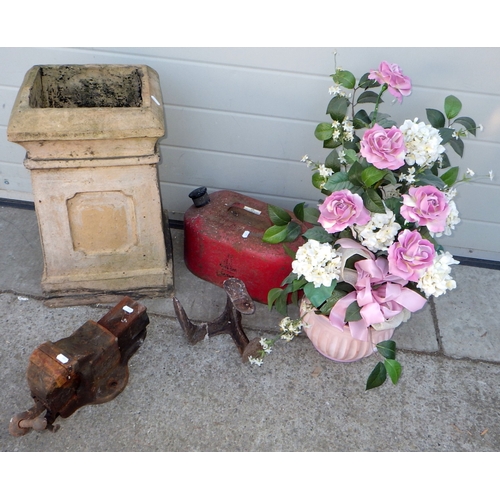 A chimney pot, show last, vice, flower arrangement , petrol can (5)