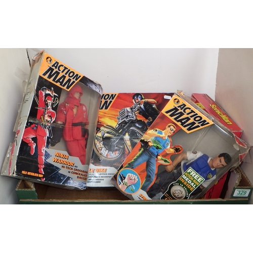 An Action Man Missile Bike and two boxed Action Man dolls together with ...