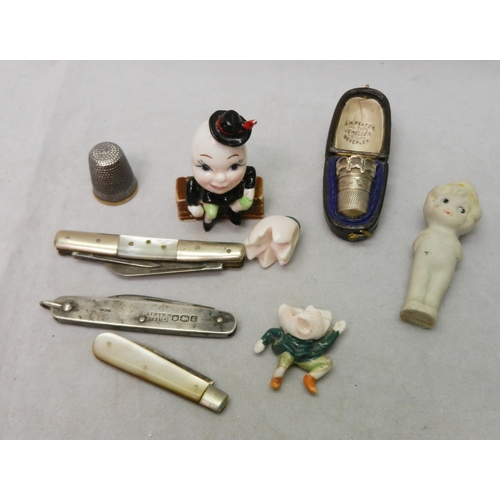 A silver slabbed pocket knife; a silver bladed folding knife; a cased ...
