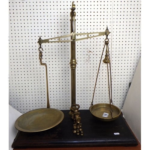 A set of early 20thC balance scales and bell weights