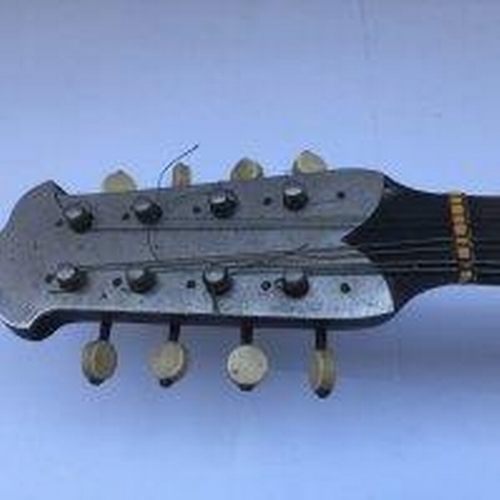 A circa 1920s cased Windsor Pyxe banjo mandolin.