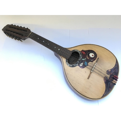 An Italian 12 string mandolin, label inside soundhole reads Salvatore D ...