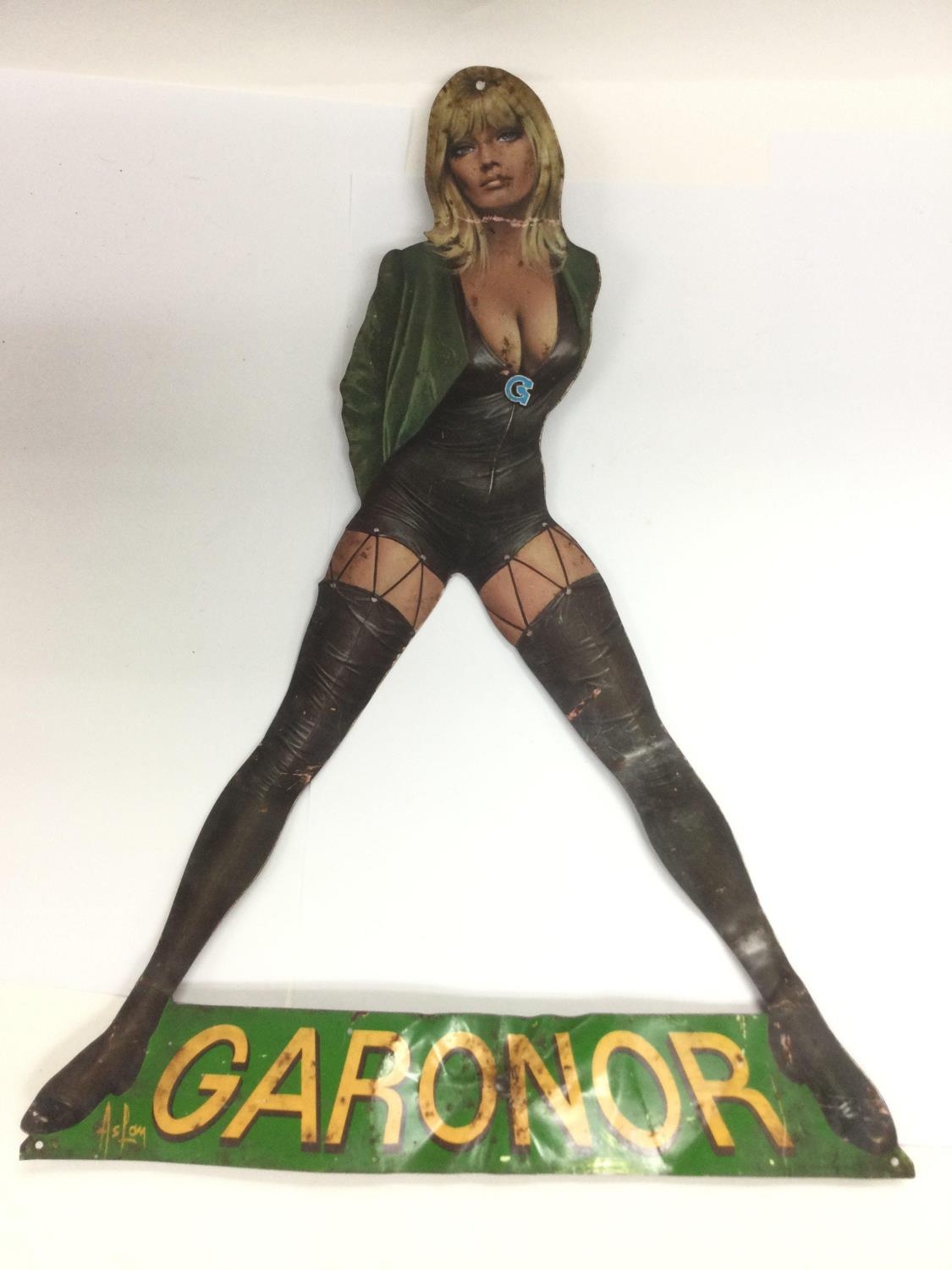 Alain Aslan. A rare 'pin up' Garonor tin sign, approx height 48cm. Shipping category B.
