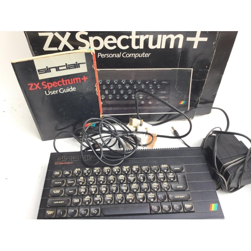A Boxed Sinclair Spectrum+ and a Collection of Games.(2).