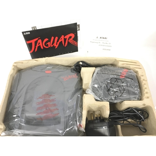 A Boxed Atari Jaguar 64-Bit interactive Multimedia System and 1 Game.(2).