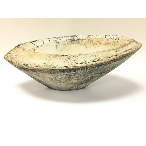 An unusual pottery studio dish. 38cm long by 15cm tall and 20cm wide ...