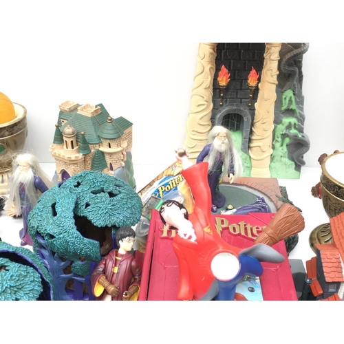 A large collection of of Harry Potter merchandise including wands ...
