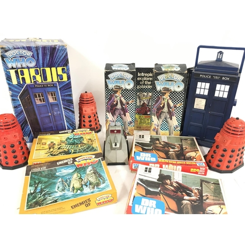 An assorted collection of Dr Who toys through the ages including ...