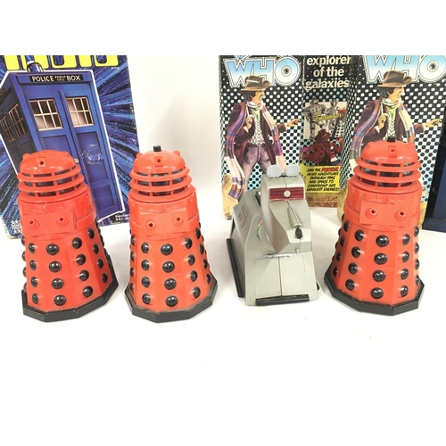An assorted collection of Dr Who toys through the ages including ...