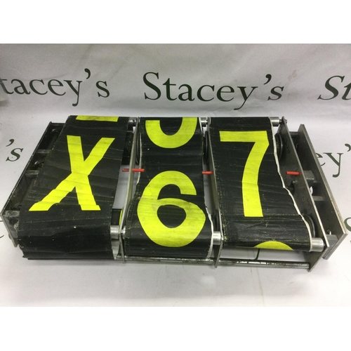 Four bus and coach stop signs plus a destination roller mechanism with ...