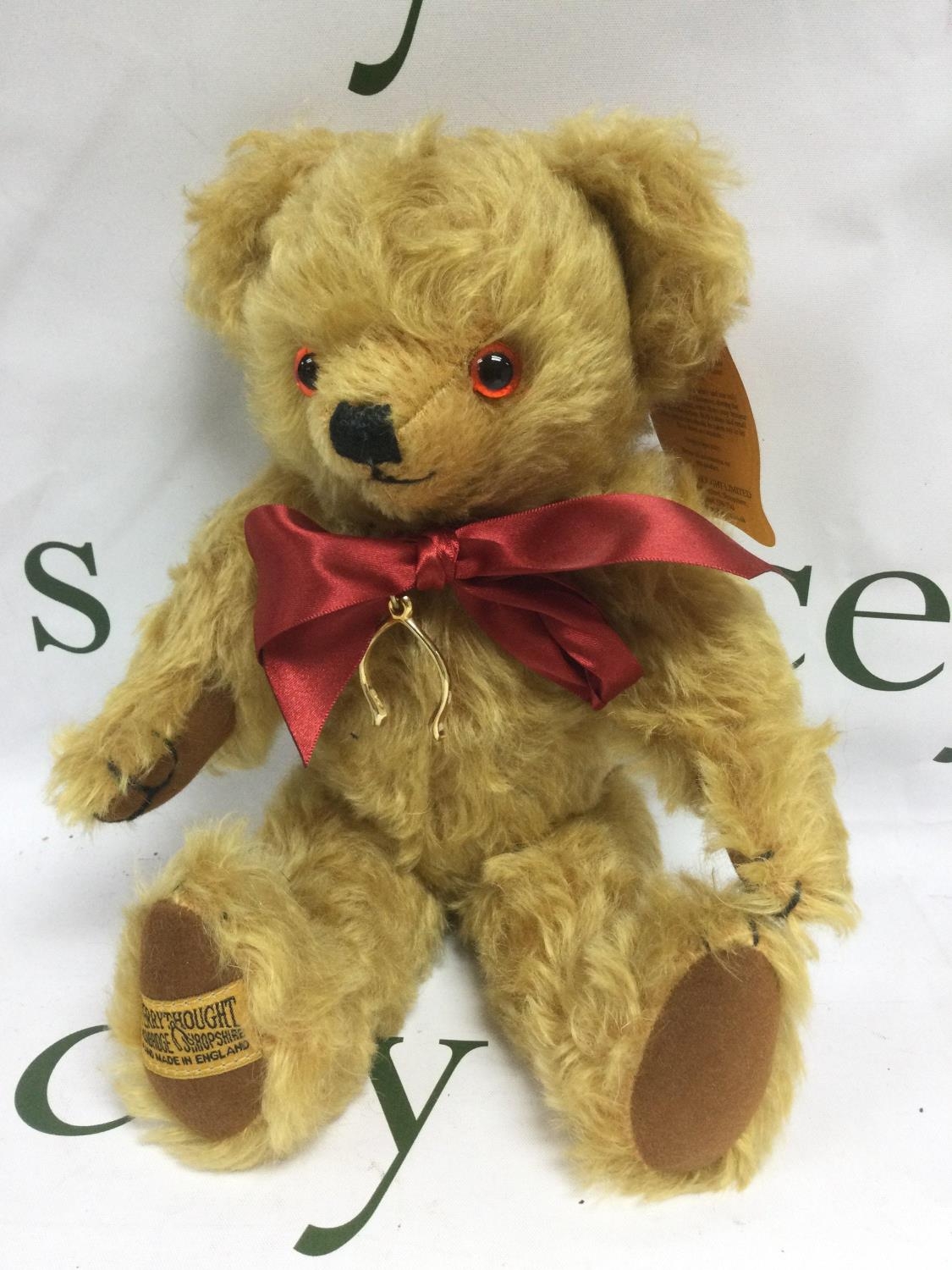 A Merrythought wishbone bear housed in a Steiff box. Shipping category ...