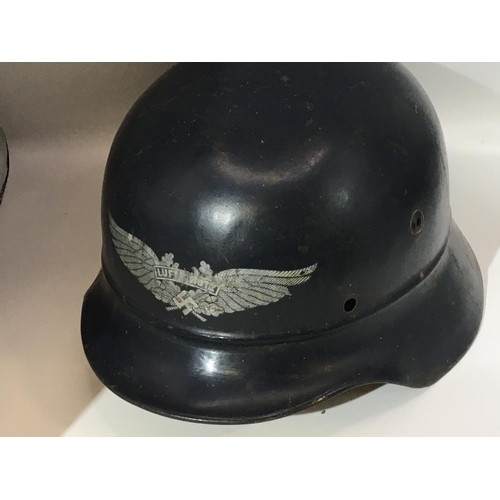 A German Third Reich Luftwaffe helmet with an unusual front decal ...