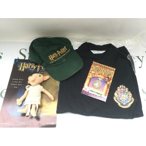 A collection of Harry Potter related items comprising a carded Dobby ...