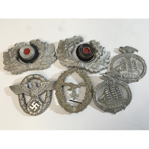 A collection of German Third Reich badges including Luftwaffe officers ...