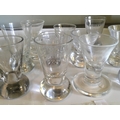 A collection of Masonic shot firing glasses. Including etched examples ...