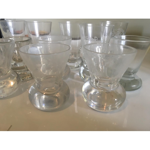 A collection of 14 Masonic shot firing glasses Tudor Lodge Star of Kent ...