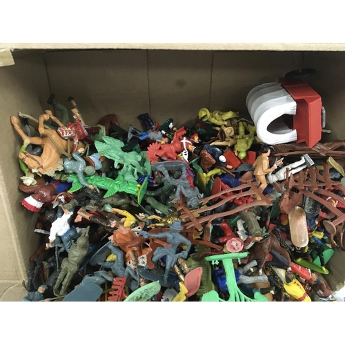 A box of Plastic figures by Britain..Crescent..Kelloggâ s..Elaston..Starlux etc.