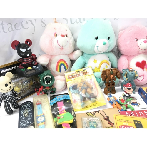 A Collection of Care Bears. Batman. Rock lords. Watches. Charmed ...